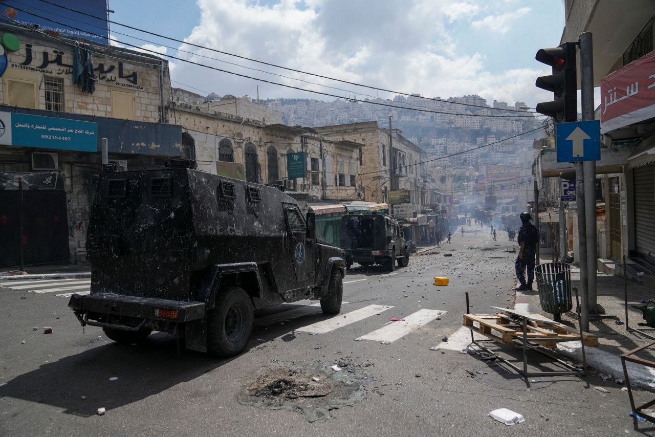 Palestinian forces, residents battle in West Bank, 1 dead