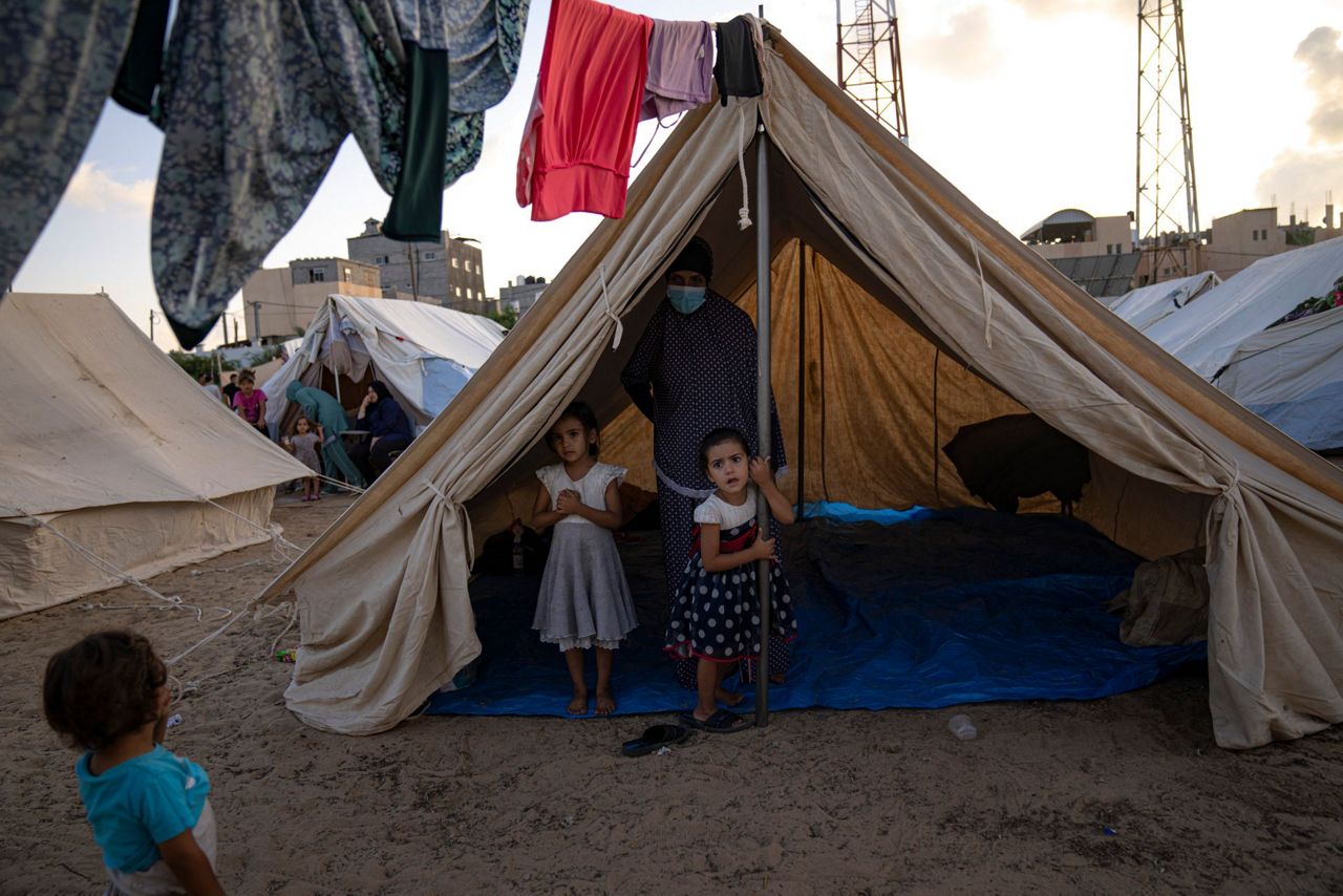 A tent camp for displaced Palestinians pops up in southern Gaza ...