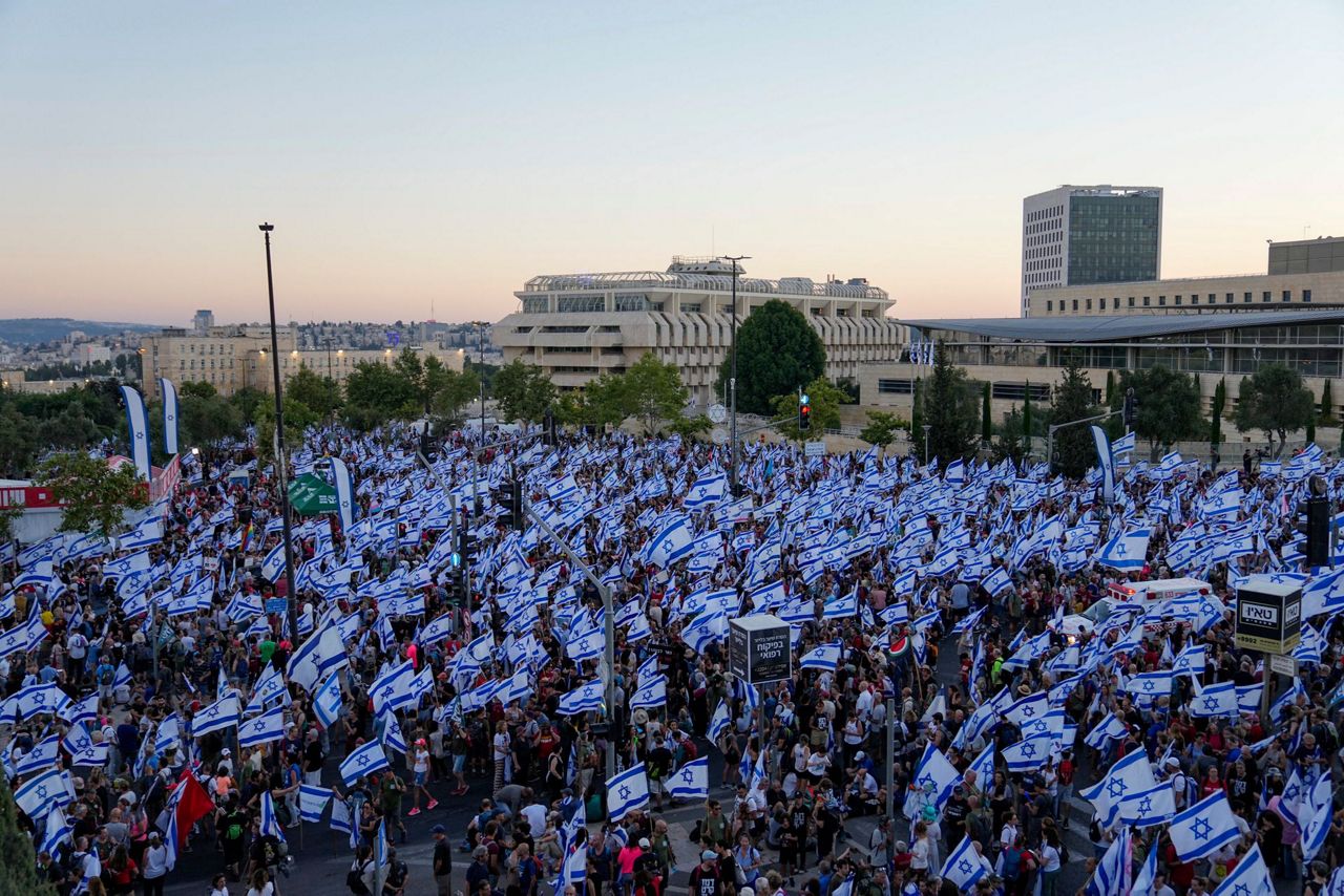 Hundreds of thousands march in Israel. Former security chiefs beg ...