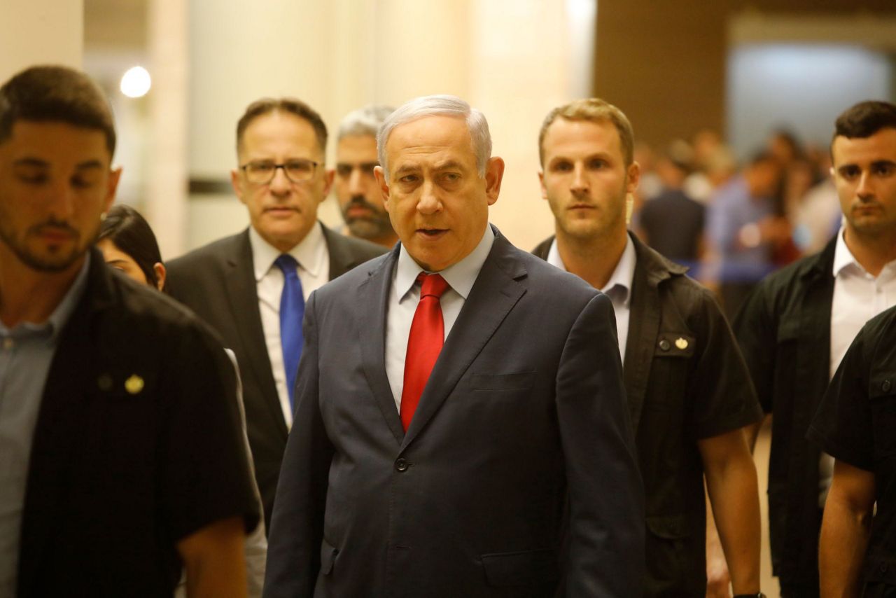 The Latest: Israeli legislators move closer to early vote
