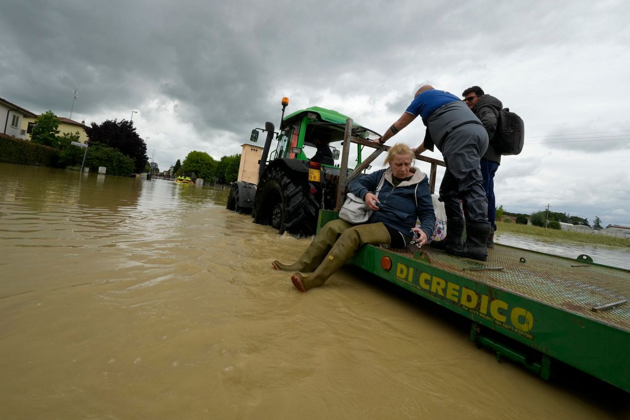 Crews work to reach Italian towns isolated by floods as cleanup begins