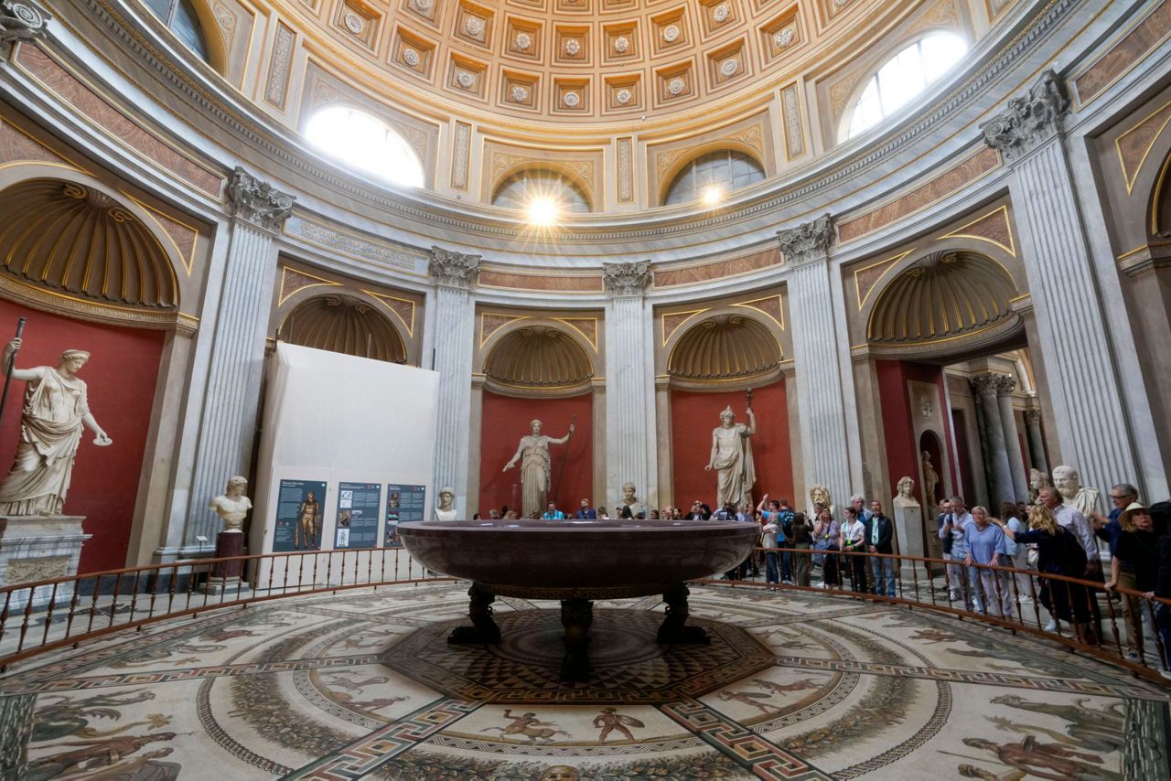 Vatican experts uncovering gilded glory of Hercules statue struck by ...