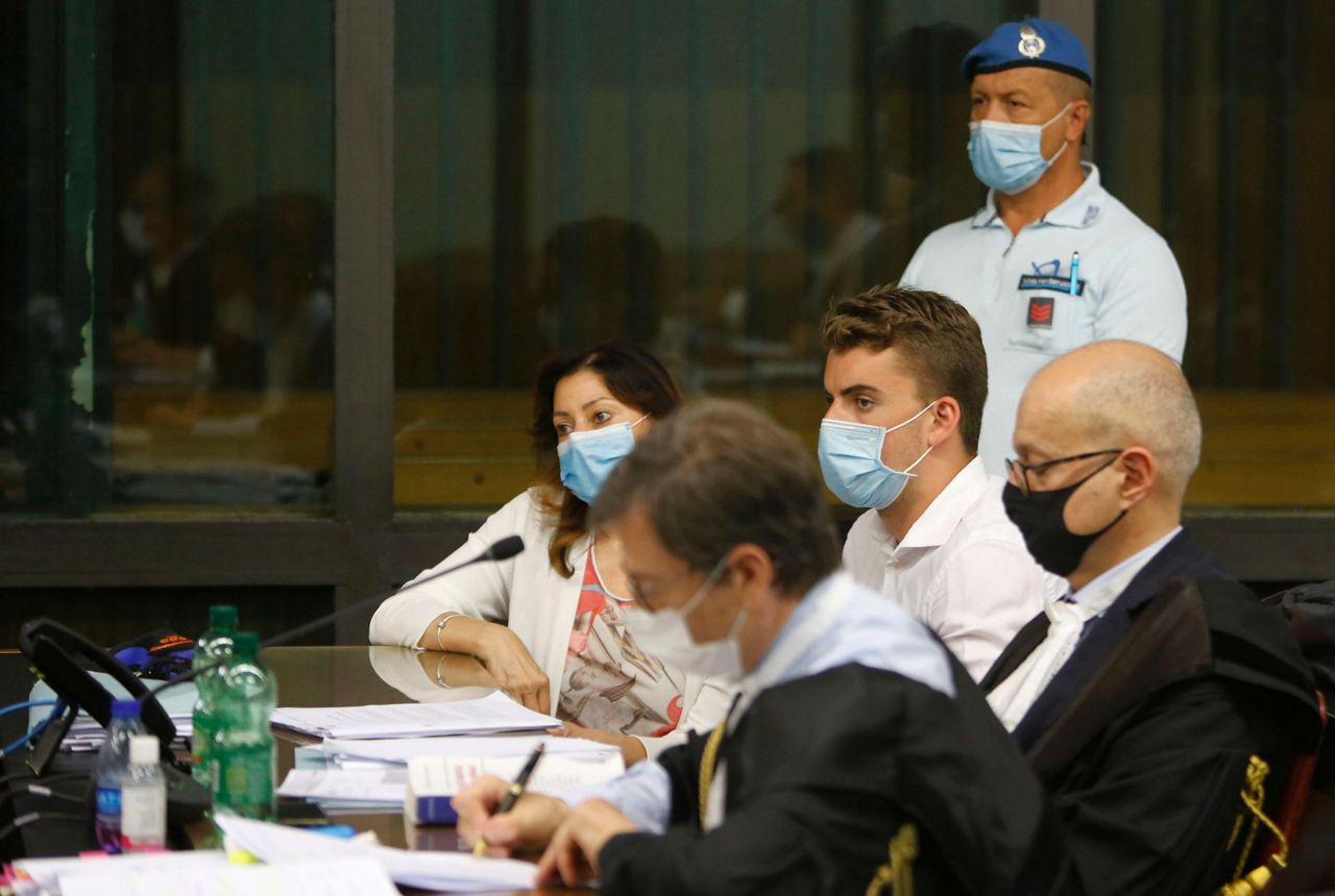 Police partner at Americans' murder trial recounts knifing