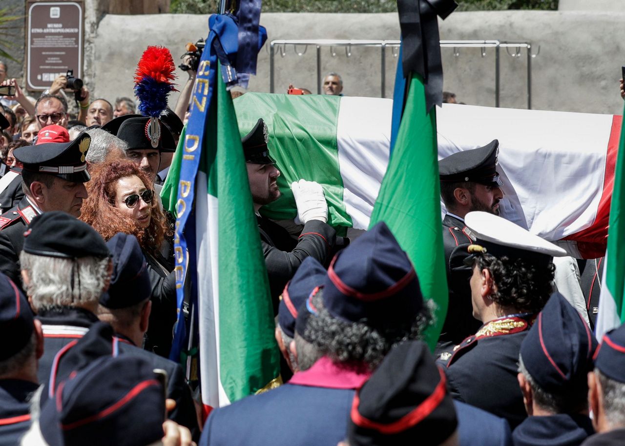 Italy police officer, allegedly slain by Americans, mourned