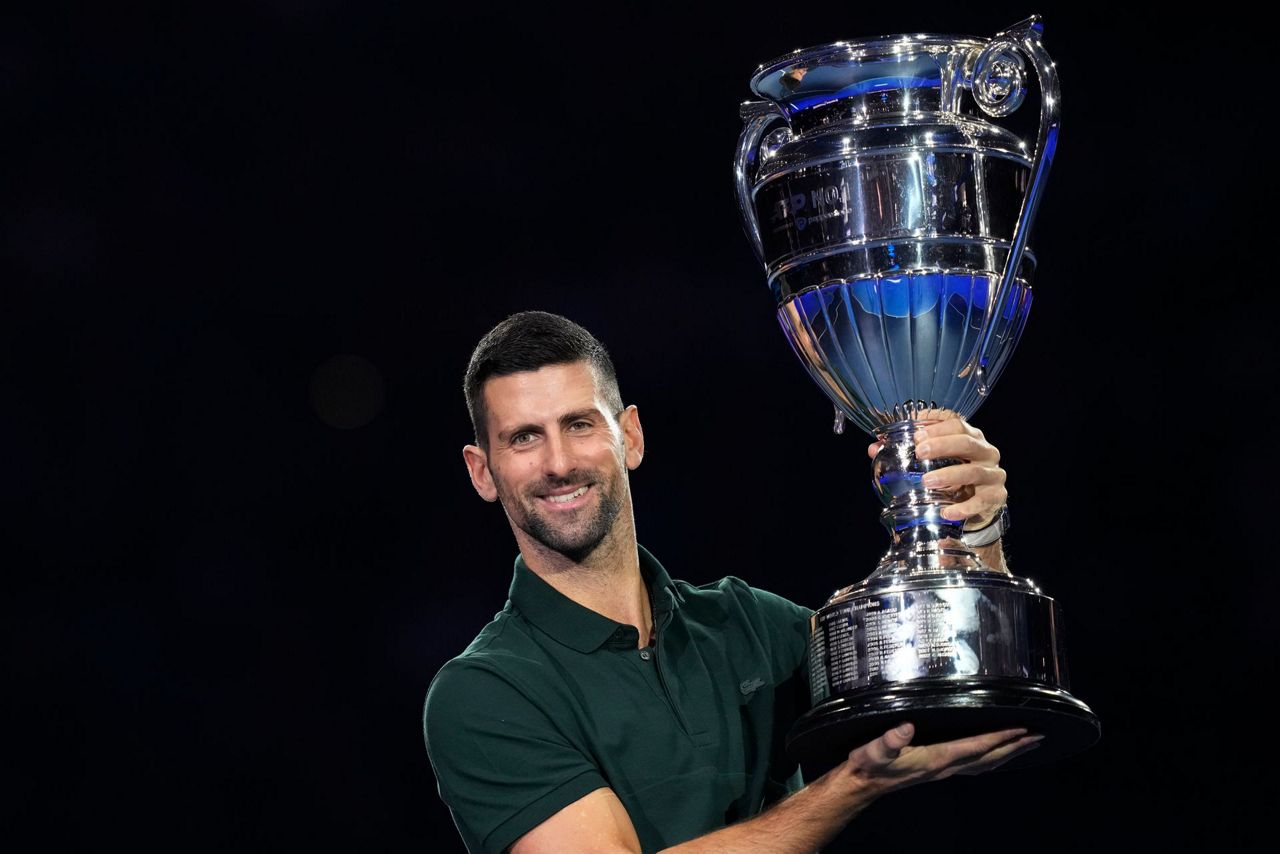 Novak Djokovic gets his trophy after securing year-end No. 1 ranking ...
