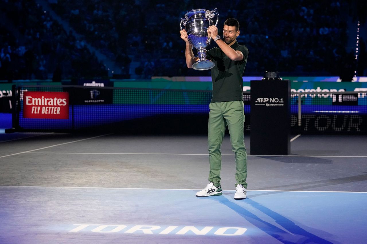 Novak Djokovic gets his trophy after securing year-end No. 1 ranking ...