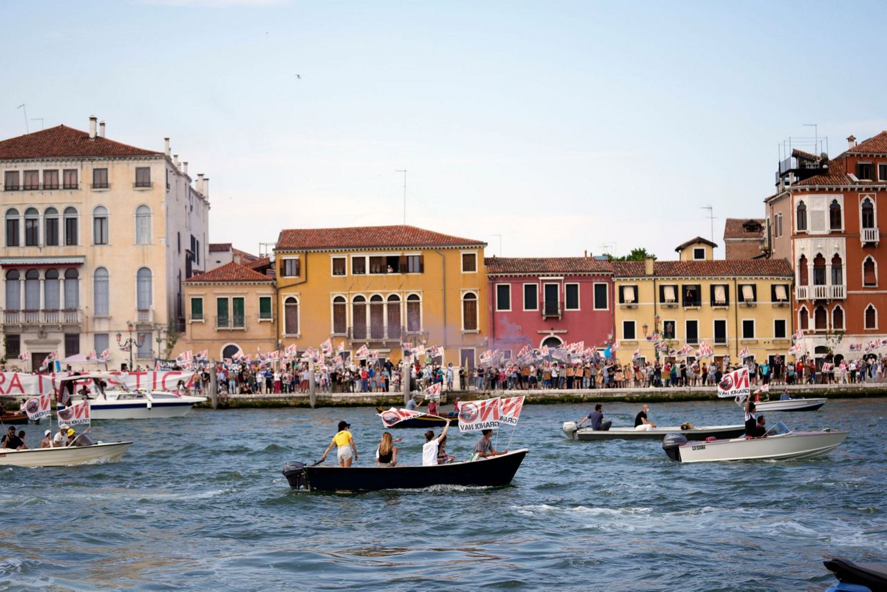 Cruise ships restart in Venice; protesters decry their risks