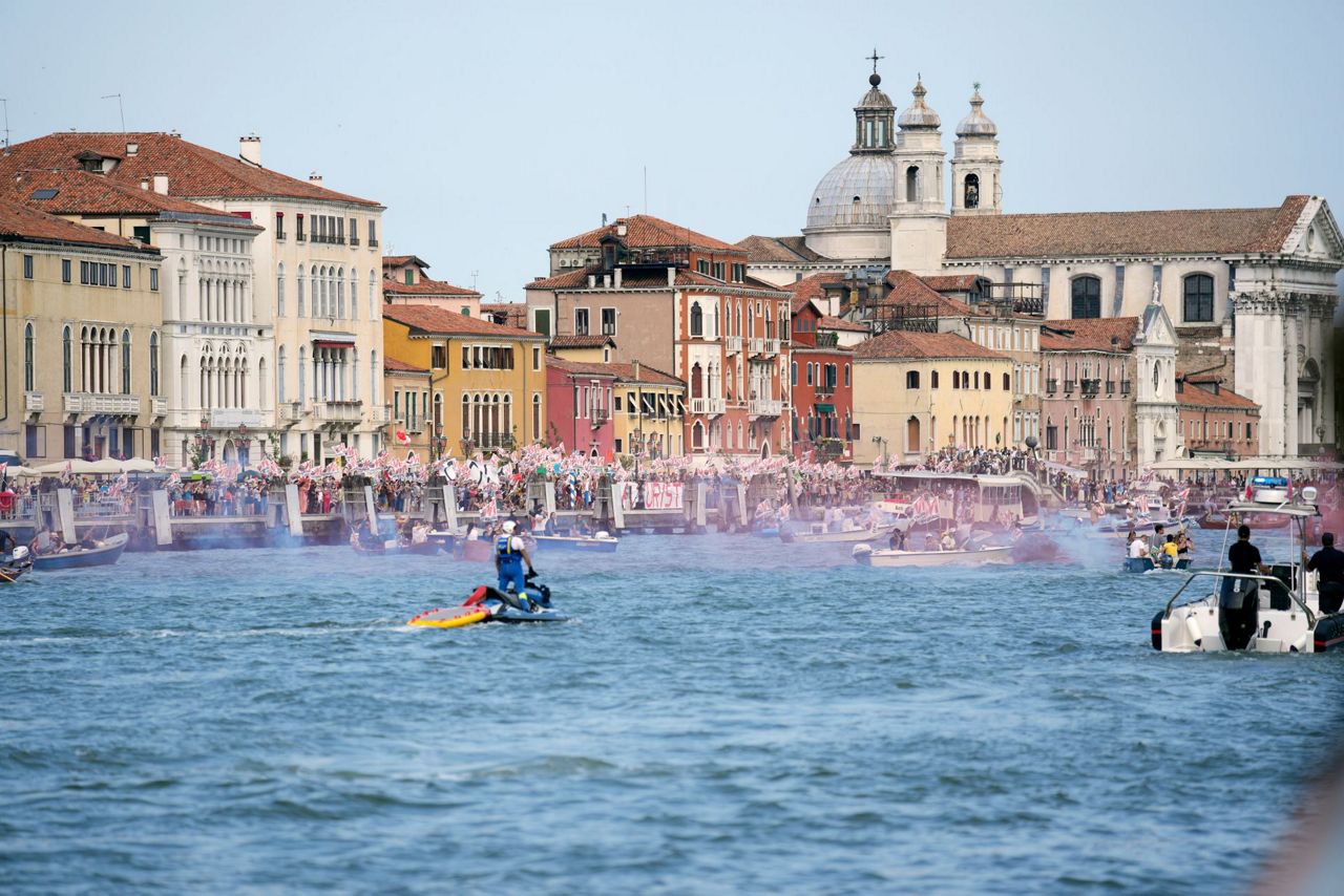 Cruise ships restart in Venice; protesters decry their risks