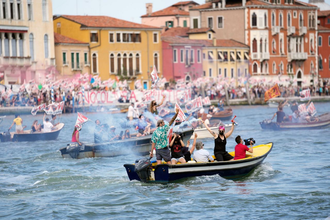 Cruise ships restart in Venice; protesters decry their risks