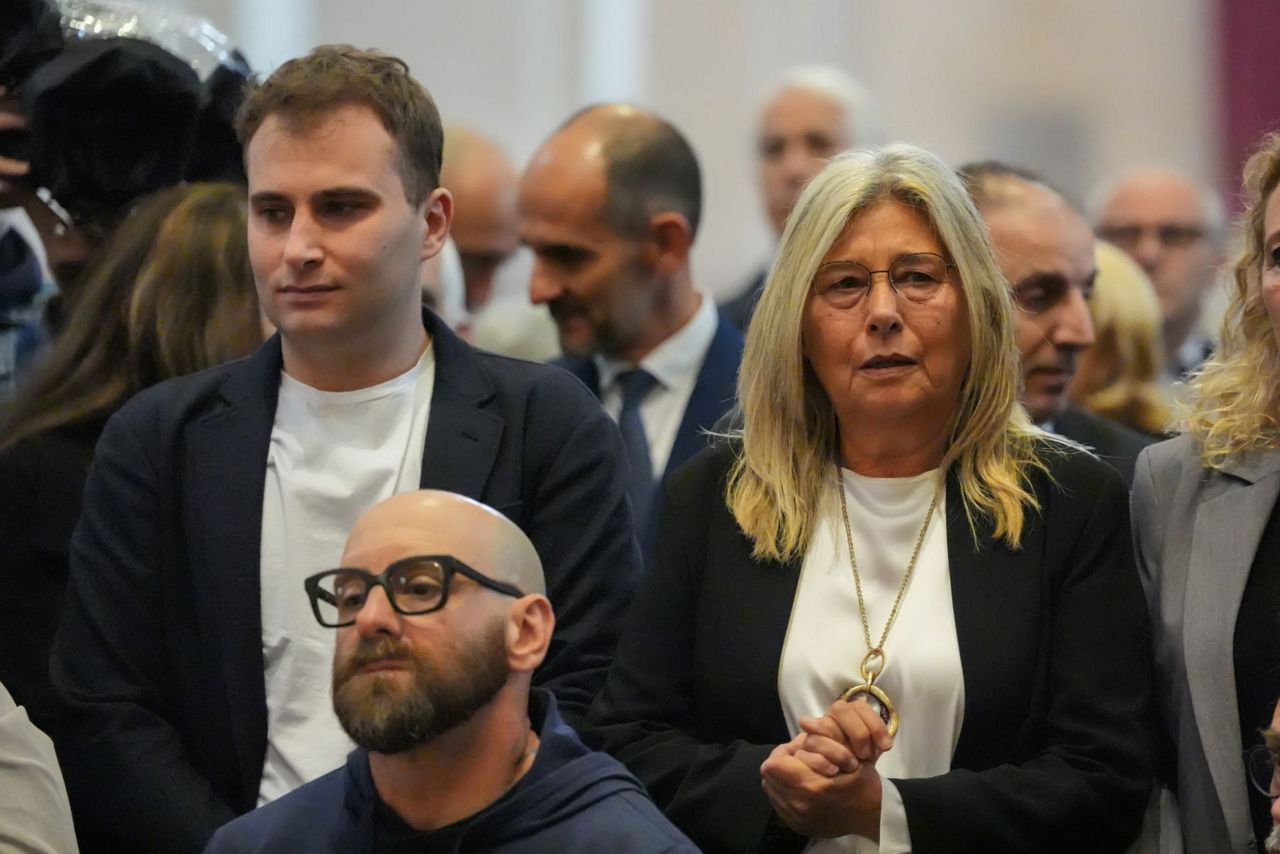 Thousands at funeral for Italian auto champ and Paralympic gold ...