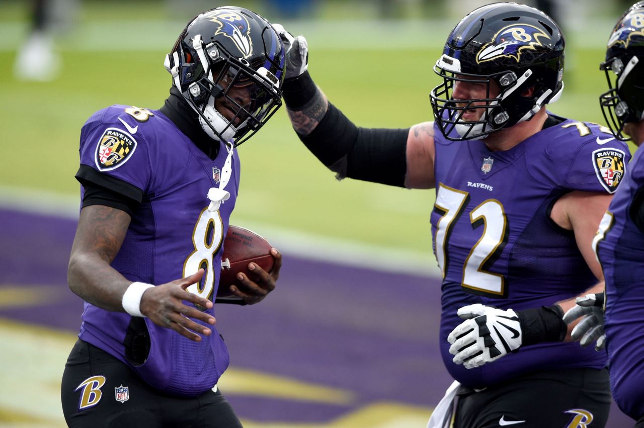 Jackson leads surging Ravens to 40-14 rout of Jaguars