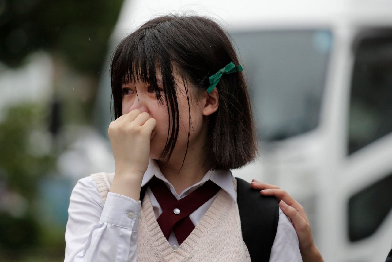 Police search Kyoto animation studio where fire killed 33