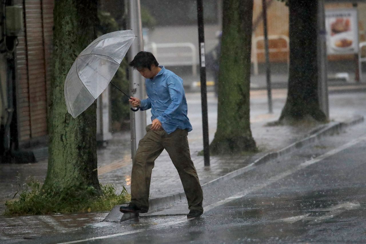 The Latest: Powerful typhoon makes landfall in Japan