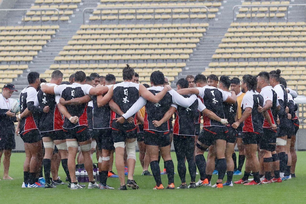 As Japan braces for typhoon, rugby squad trains in the rain