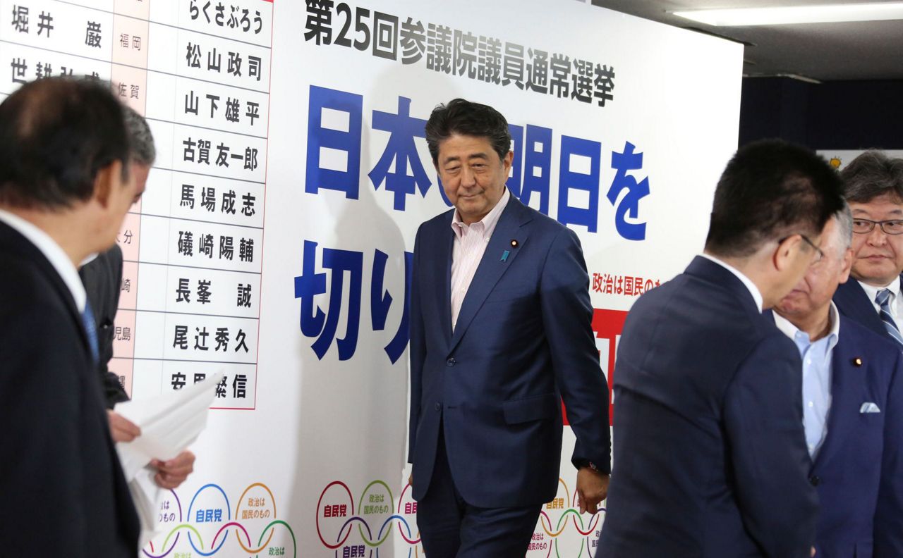 Japan votes for upper house; Abe's party seen as favorite