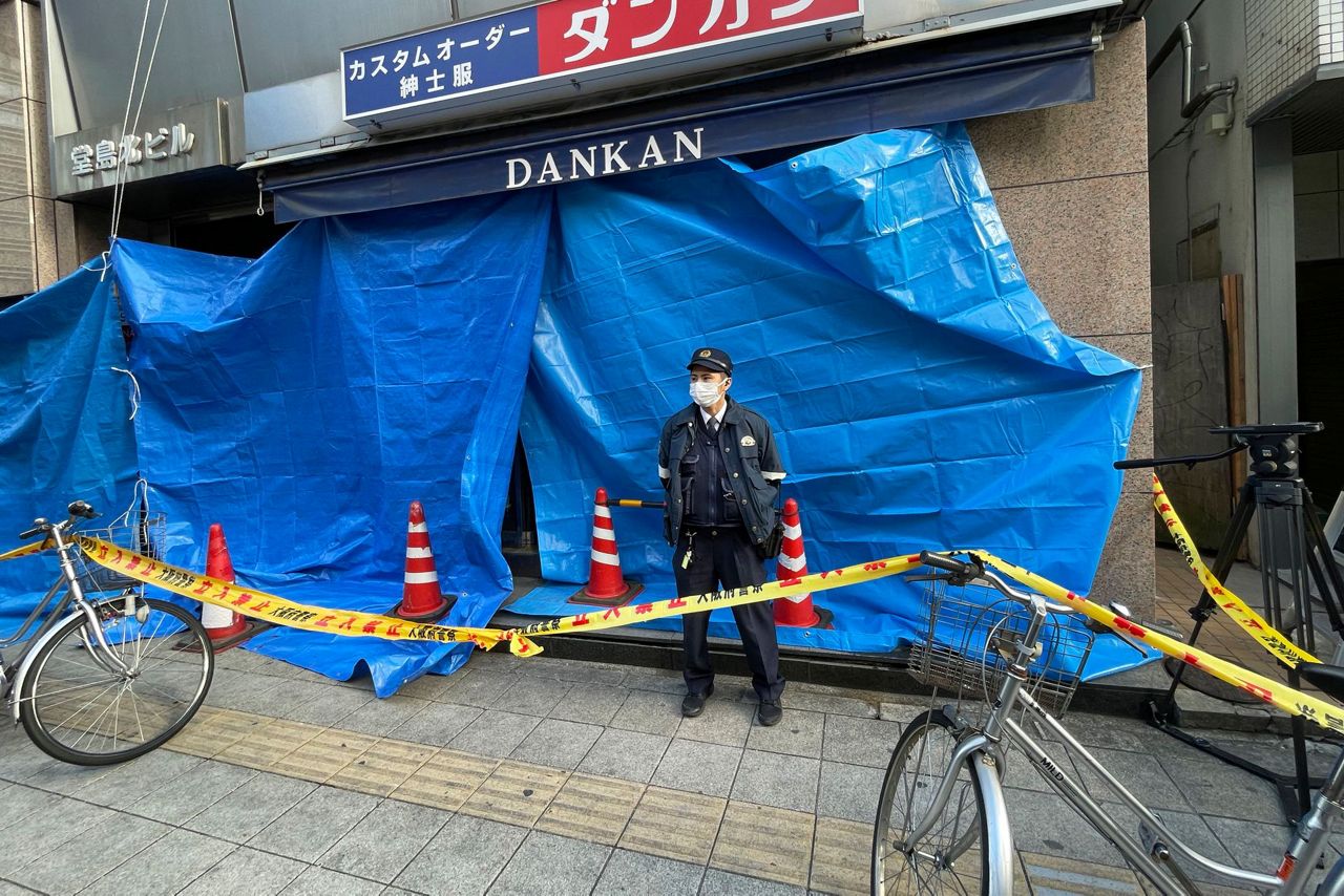 Japan police search house of man linked to deadly Osaka fire