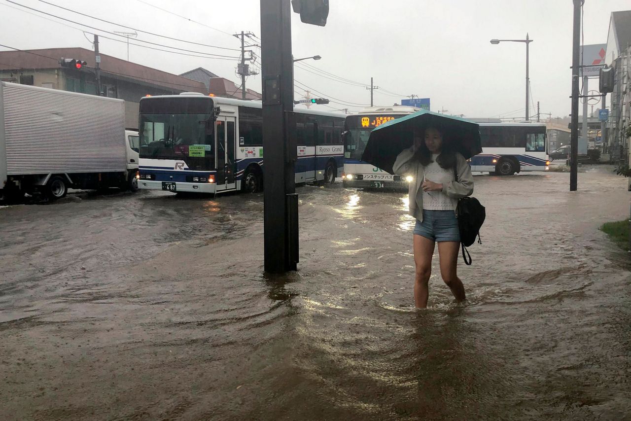 Torrential rain in eastern Japan causes flooding near Tokyo