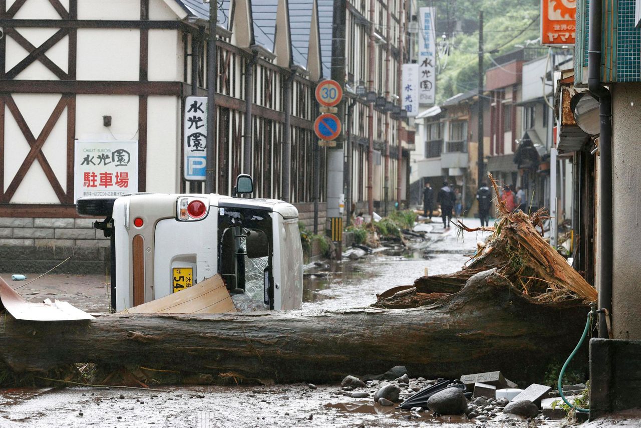 Japan battered by more heavy rain, floods, nearly 60 dead