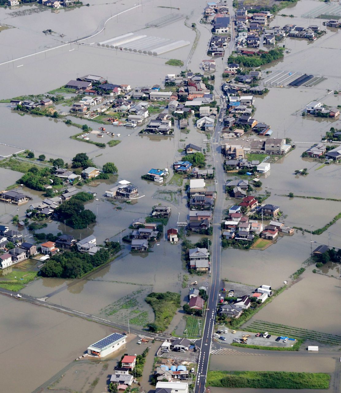 Japan battered by more heavy rain, floods, nearly 60 dead