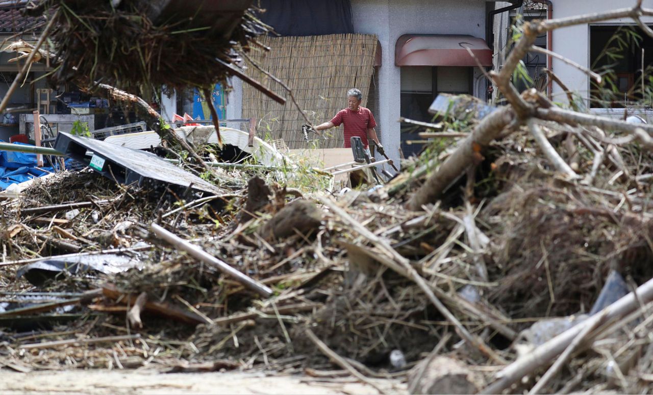 Japan tackles rescue, cleanup from massive damage from rain