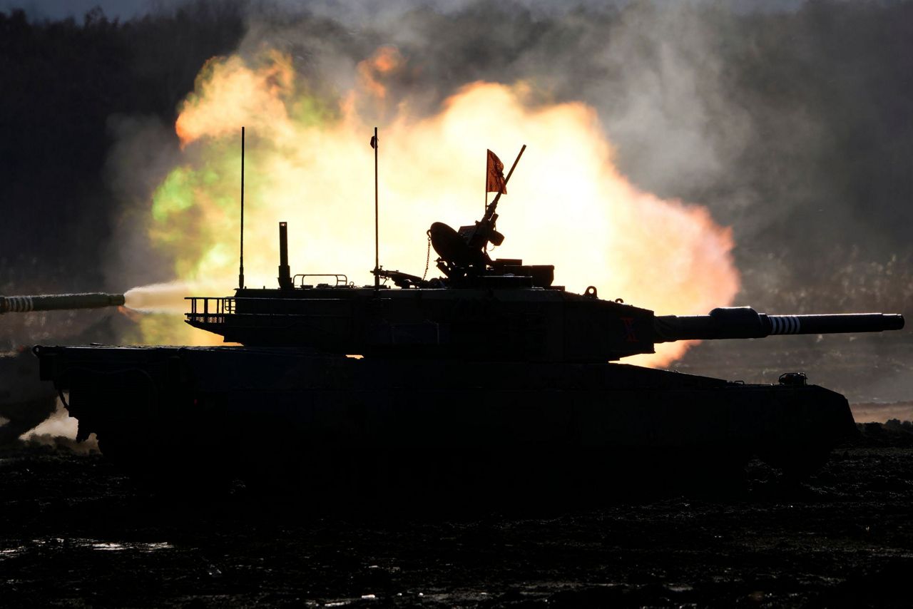 Japan's military, among world's strongest, looks to build