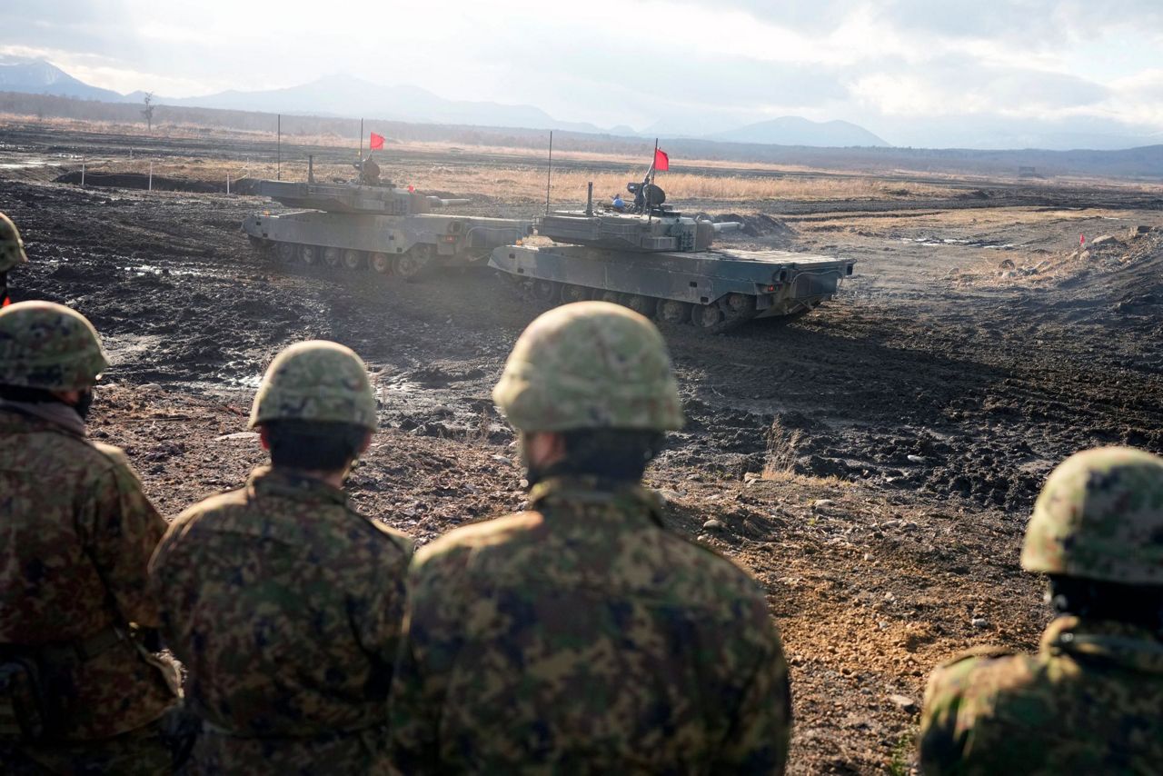 Japan's military, among world's strongest, looks to build