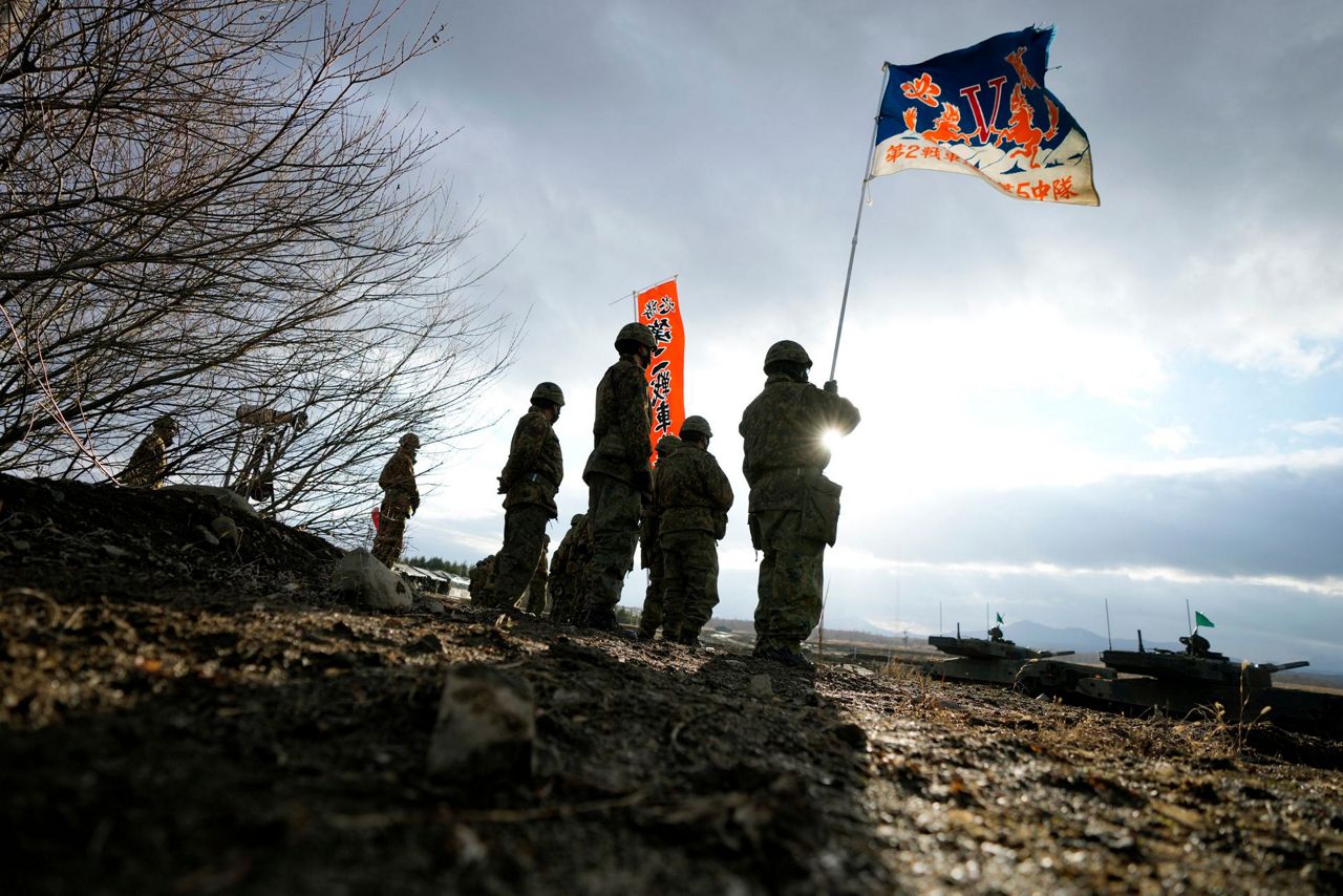 Japan's military, among world's strongest, looks to build
