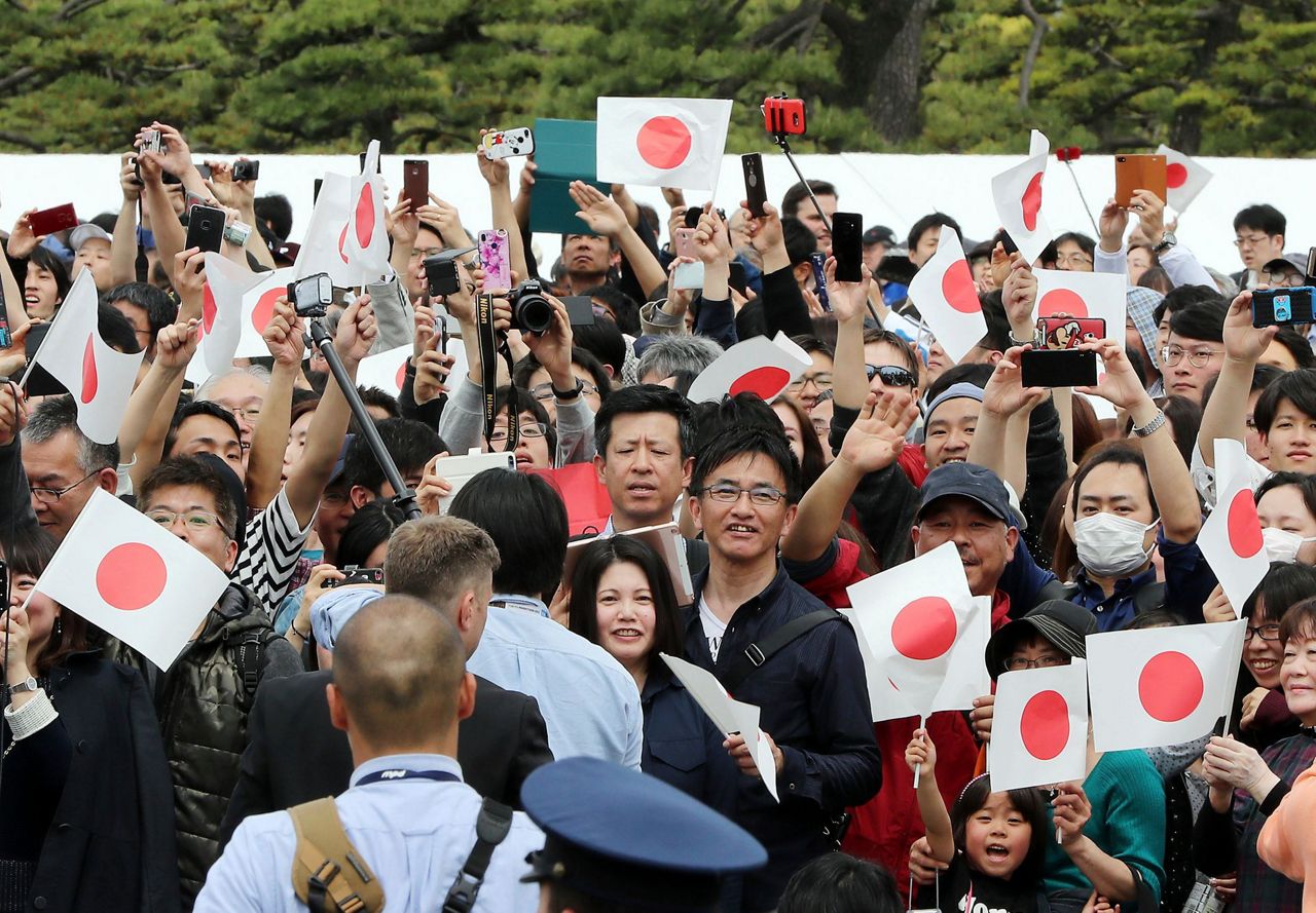 The Latest: Emperor Naruhito inherits Imperial regalia