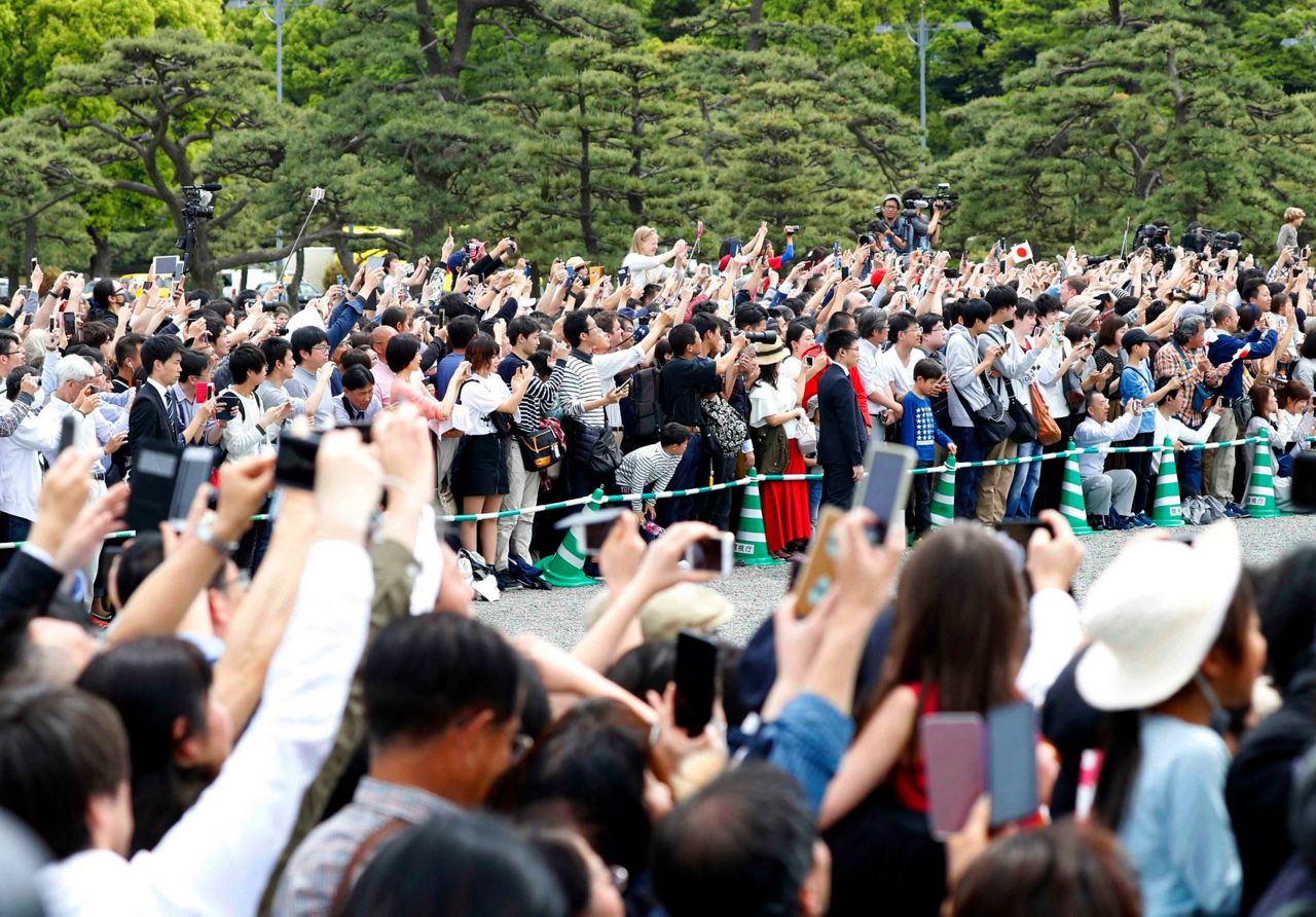 The Latest: Emperor Naruhito inherits Imperial regalia