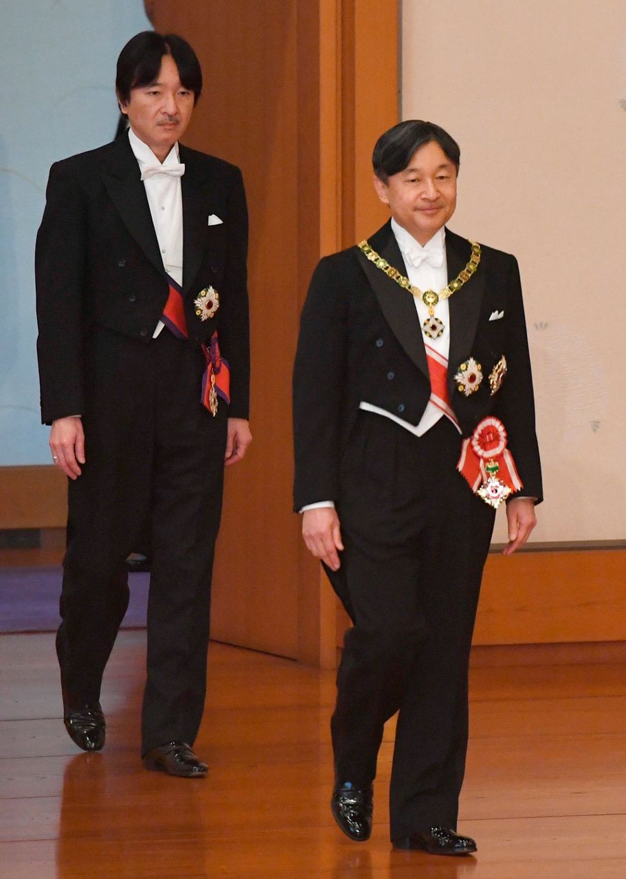 Emperor Naruhito takes throne day after his father abdicates