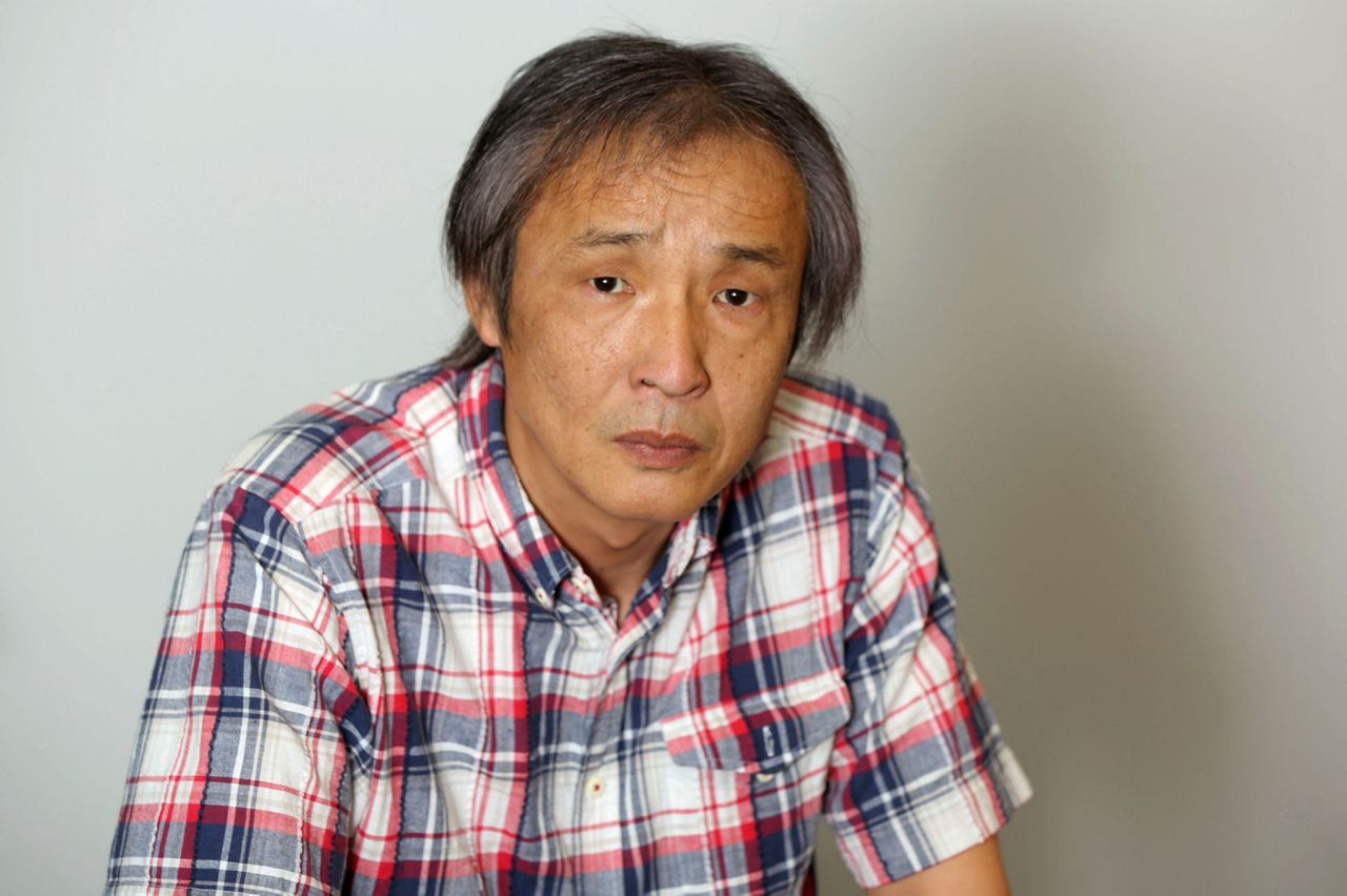 Toru Takahashi, respected AP Asia photo editor, dies at 62
