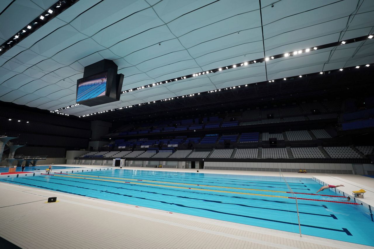 Olympic swim venue ready and now comes hard part: COVID-19