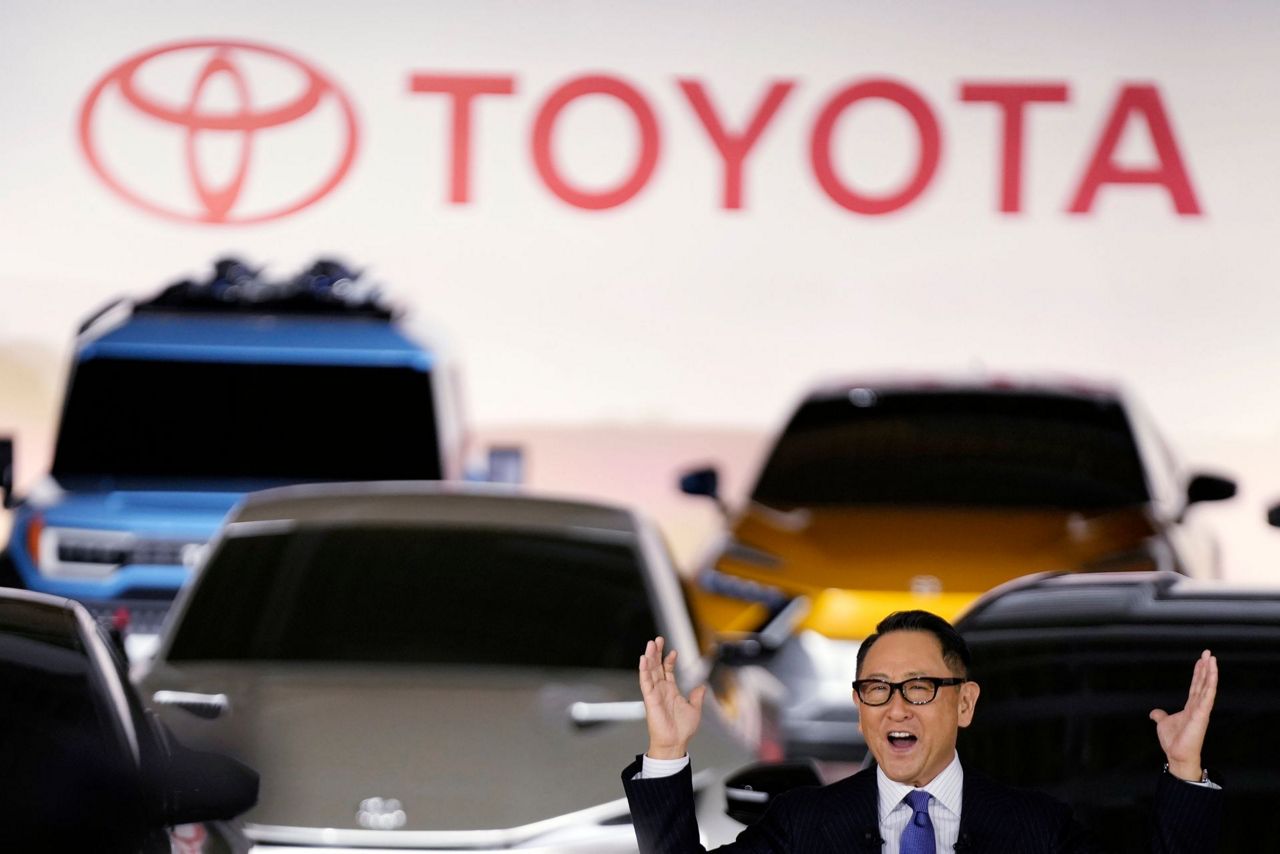 Japan's Toyota promises more electric models, investment
