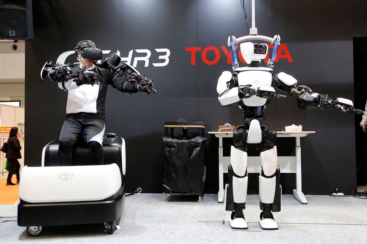 Toyota's humanoid duplicates movements in robotic mobility