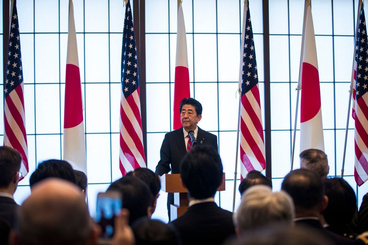 Japan's leader vows to boost nation's role in US alliance