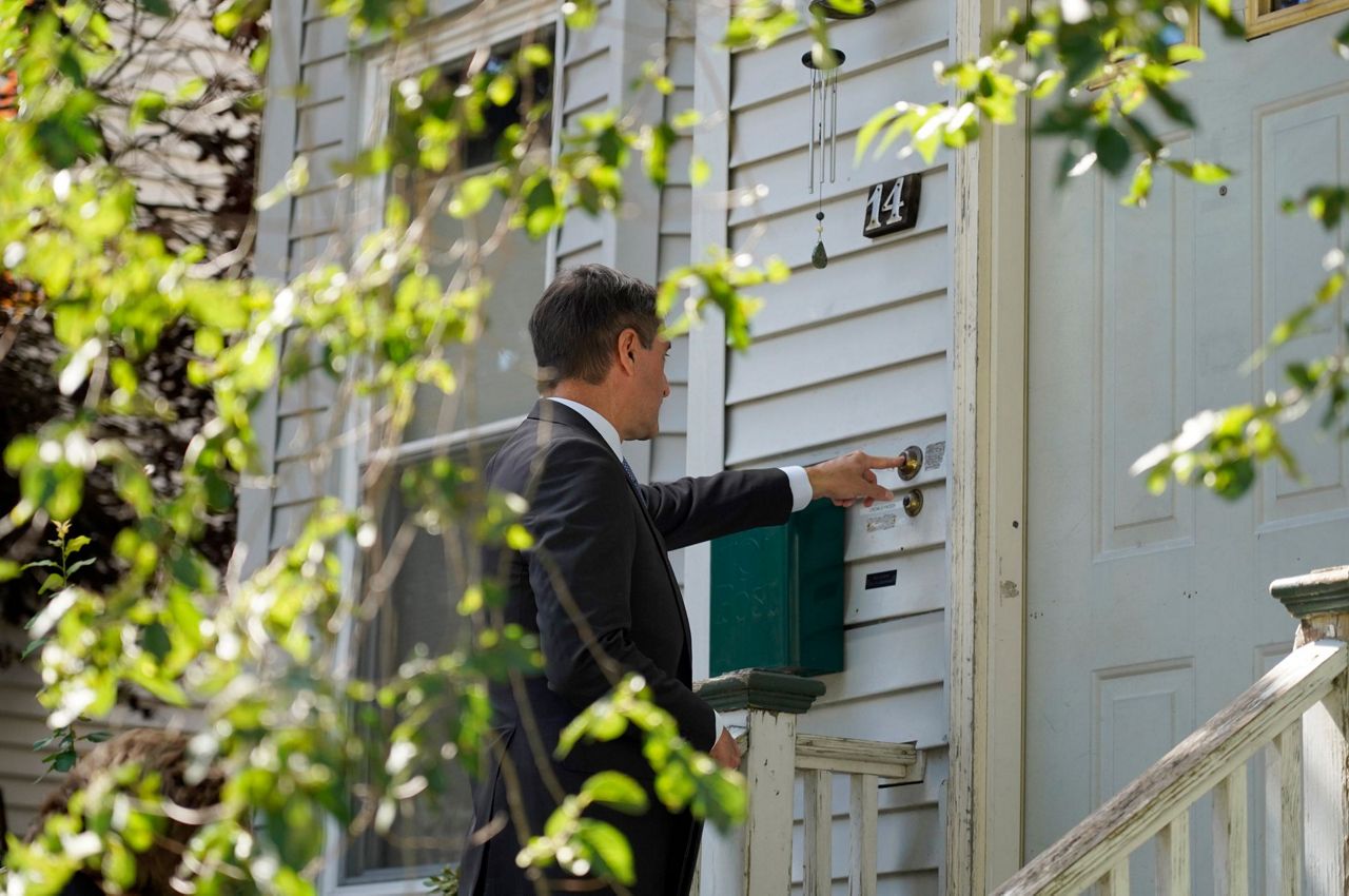 Knock, knock: Jehovah's Witnesses resume door-to-door work