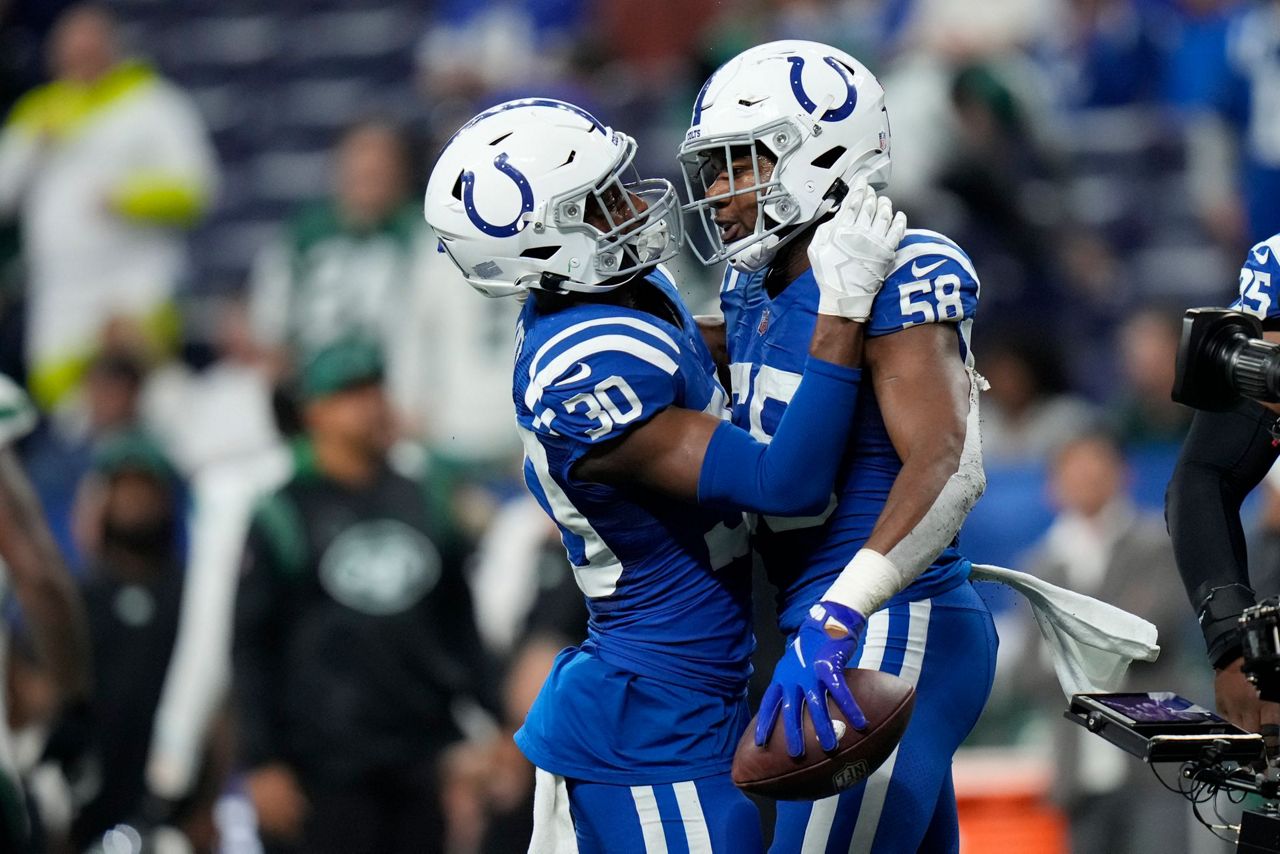 Taylor, ground game help Colts find easy path past Jets