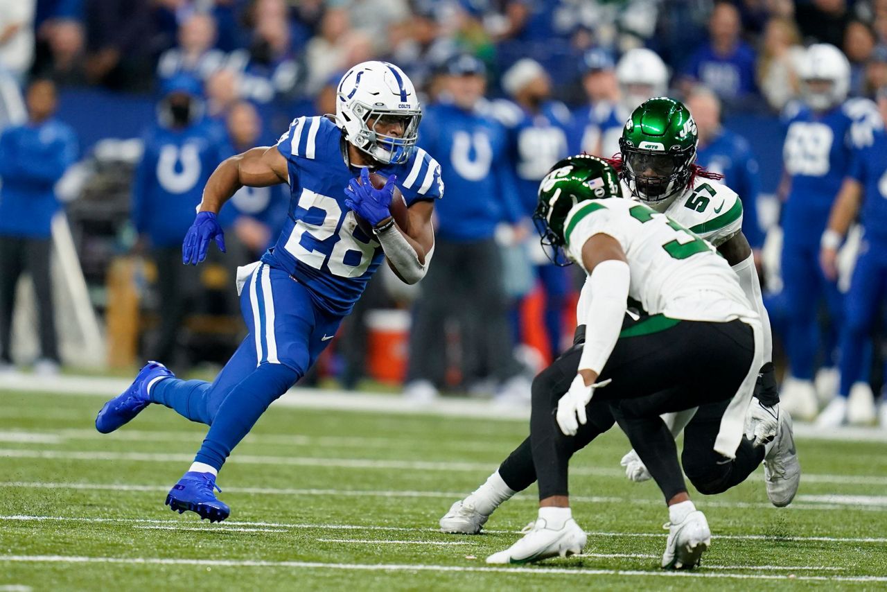 Taylor, ground game help Colts find easy path past Jets