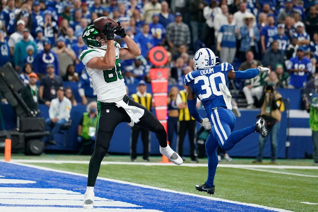 Taylor, ground game help Colts find easy path past Jets