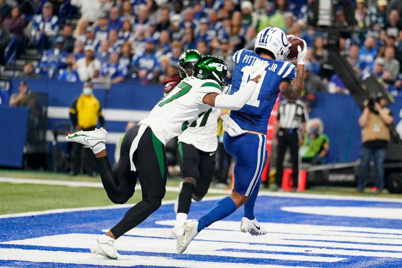 Taylor, ground game help Colts find easy path past Jets