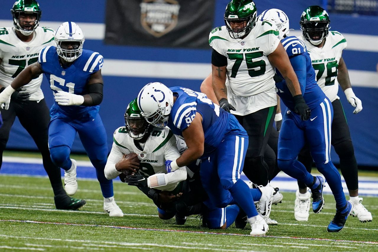 Taylor, ground game help Colts find easy path past Jets