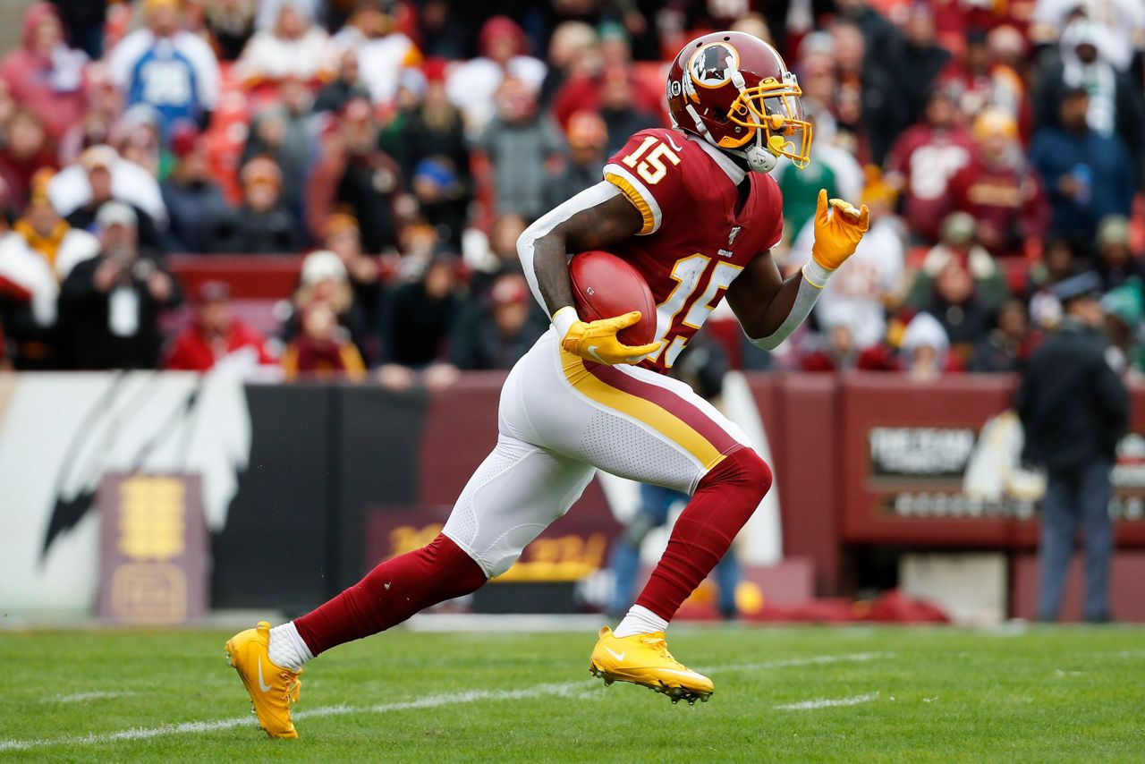 The Latest: Don Shula shows up for Dolphins game vs. Bills