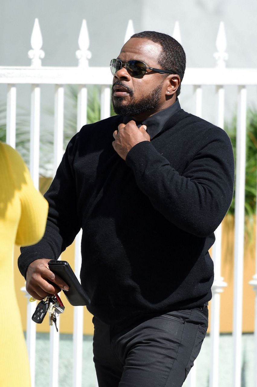 Ice Cube, others mourn director Singleton at private funeral
