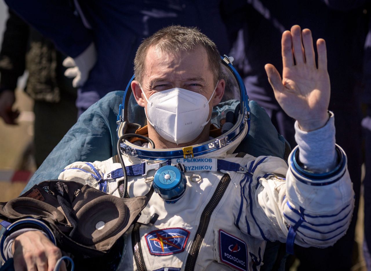 American, 2 Russians return to Earth from space station