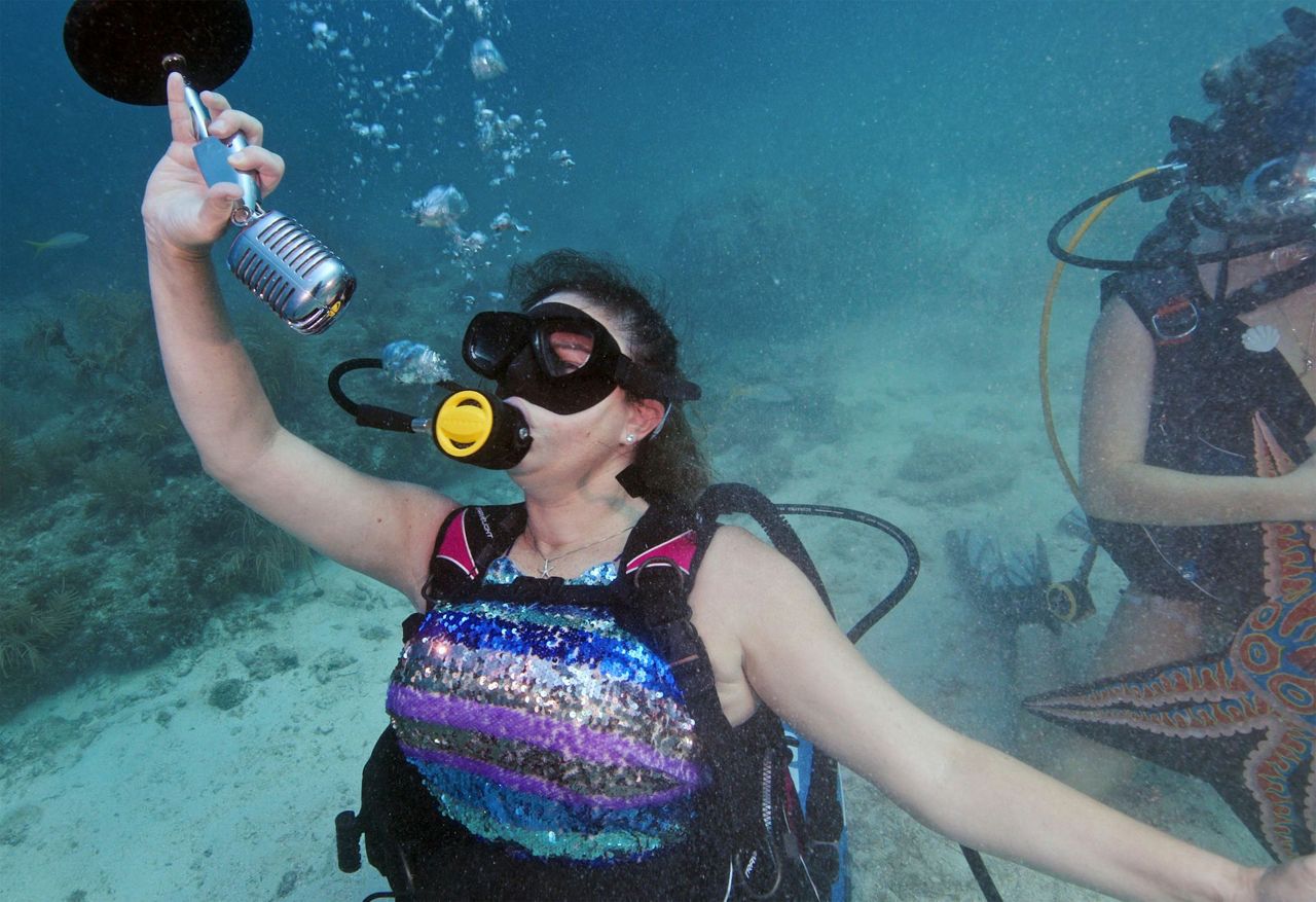 Underwater music show in the Florida Keys promotes awareness of coral ...