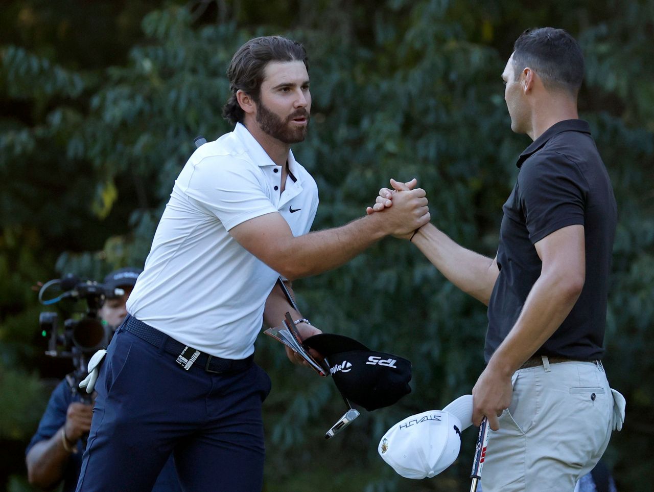 Wolff makes an ace and leads LIV Golf event over newcomers