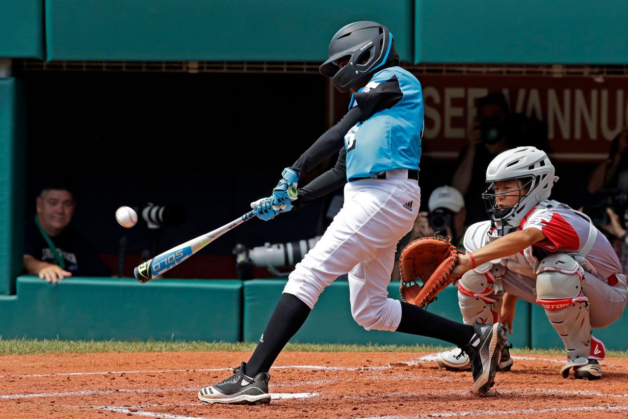 Curacao beats Japan 5-4, moves to Little League title game
