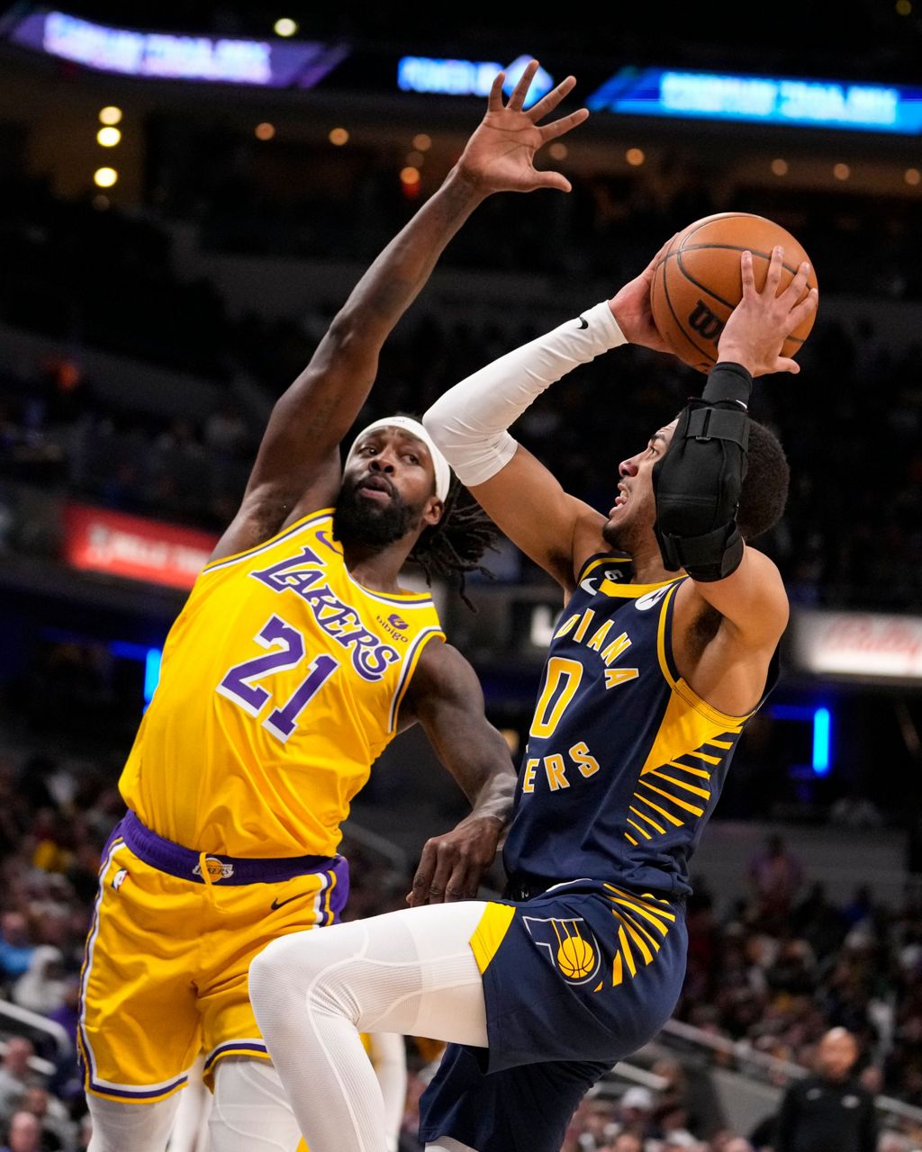 James closes in on scoring record, Lakers rally past Pacers