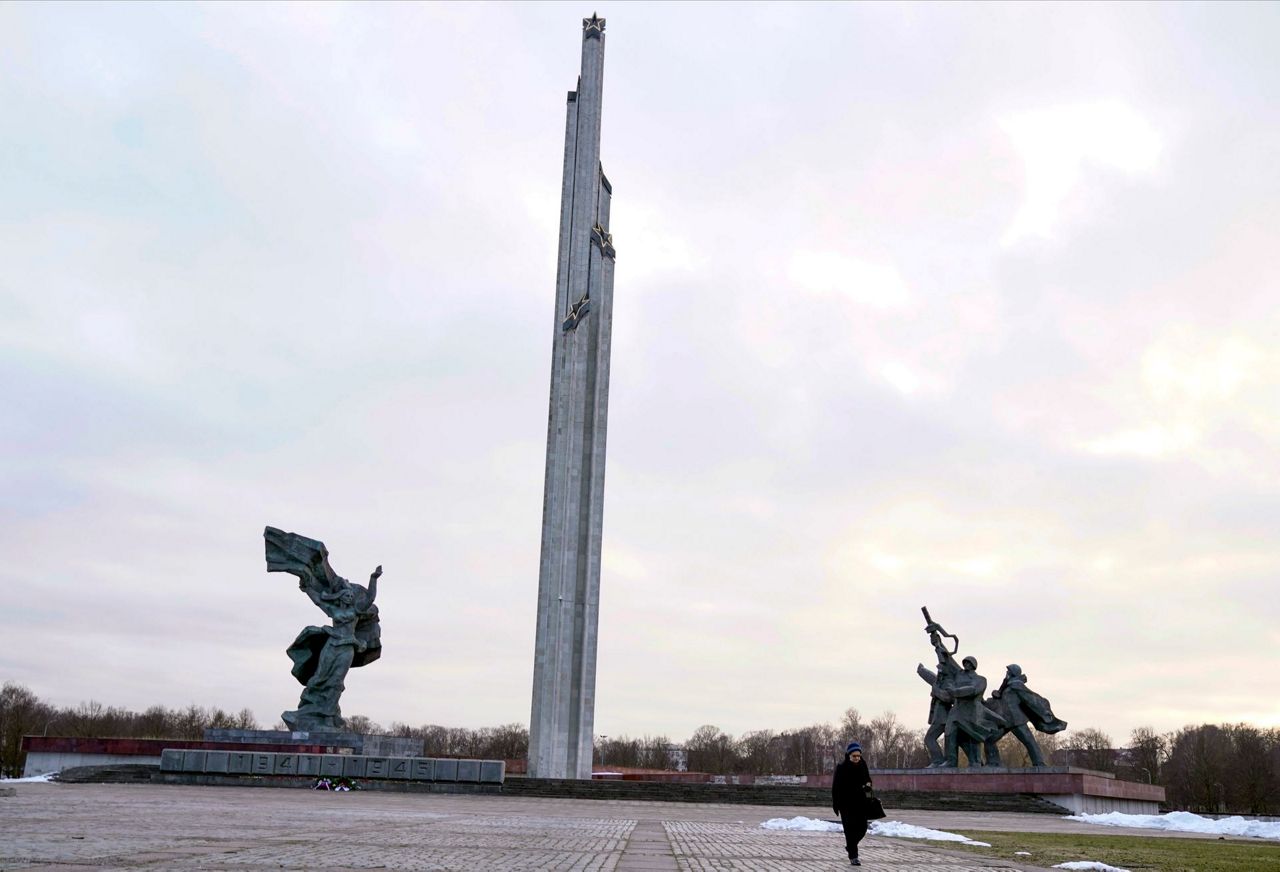 Soviet-era monument's iconic obelisk comes down in Latvia