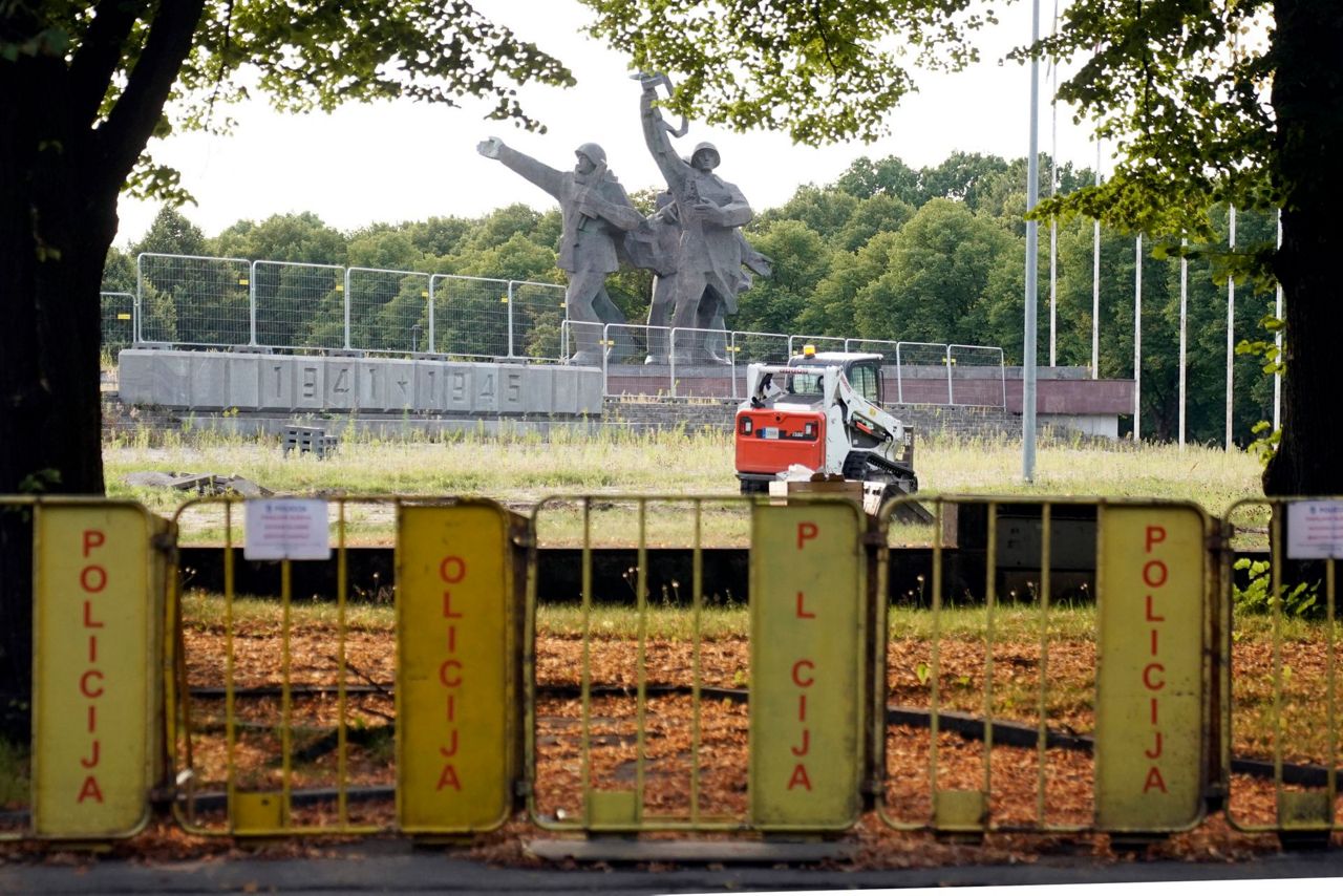 Soviet-era monument's iconic obelisk comes down in Latvia